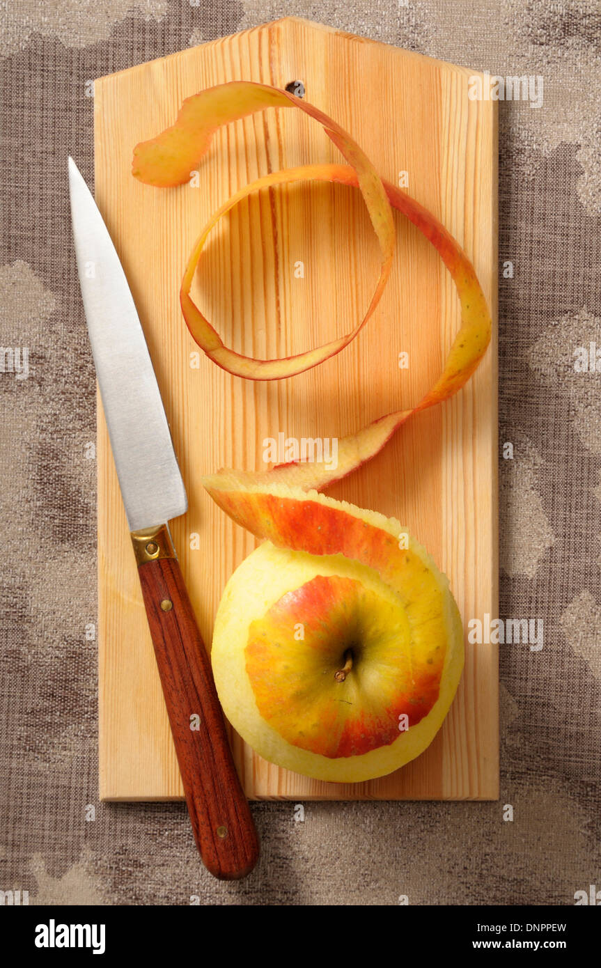 Peeling apple with knife hi-res stock photography and images - Alamy