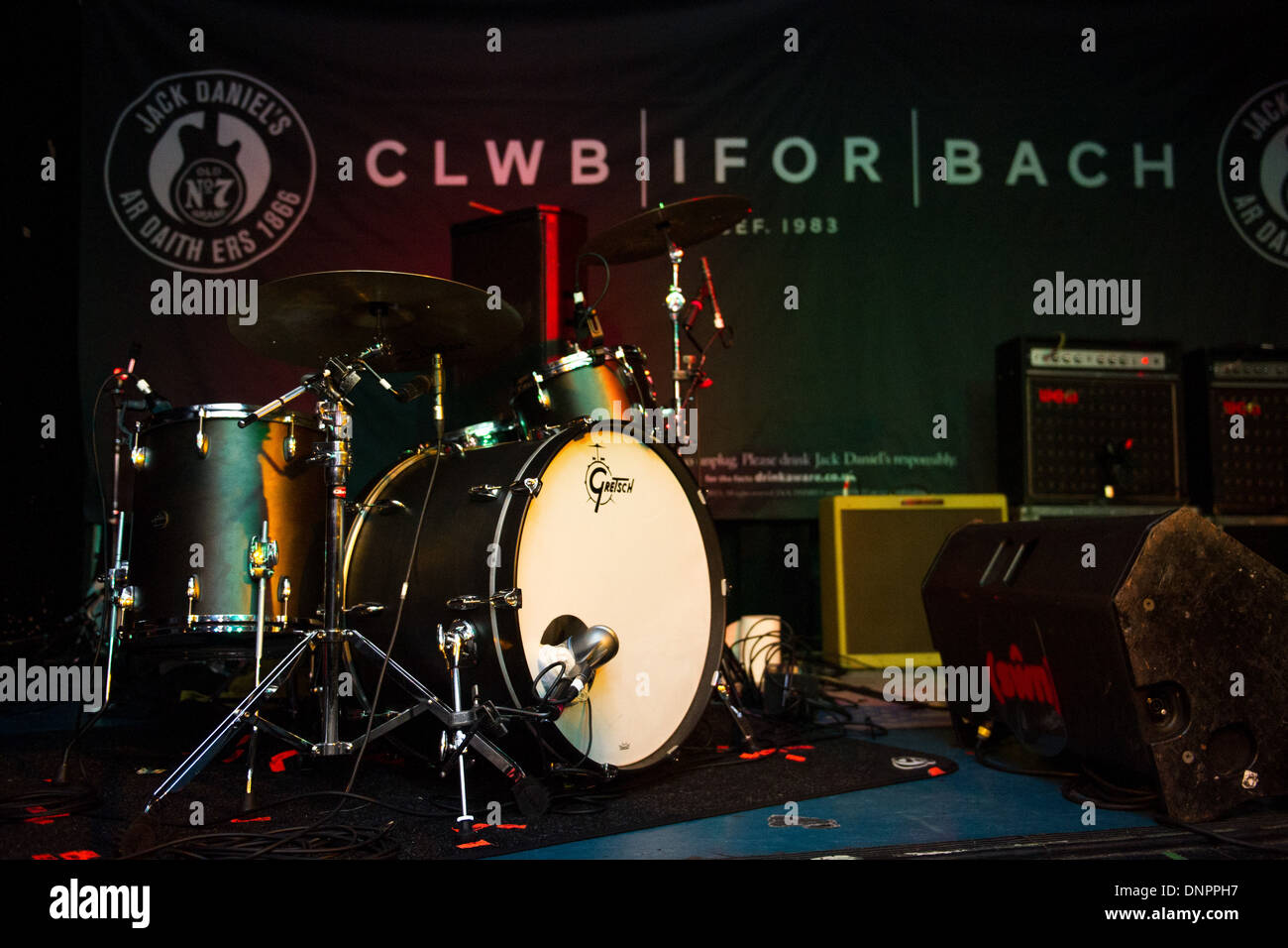 A drumkit on stage in Clwb Ifor Bach, a three-floor gig venue in ...