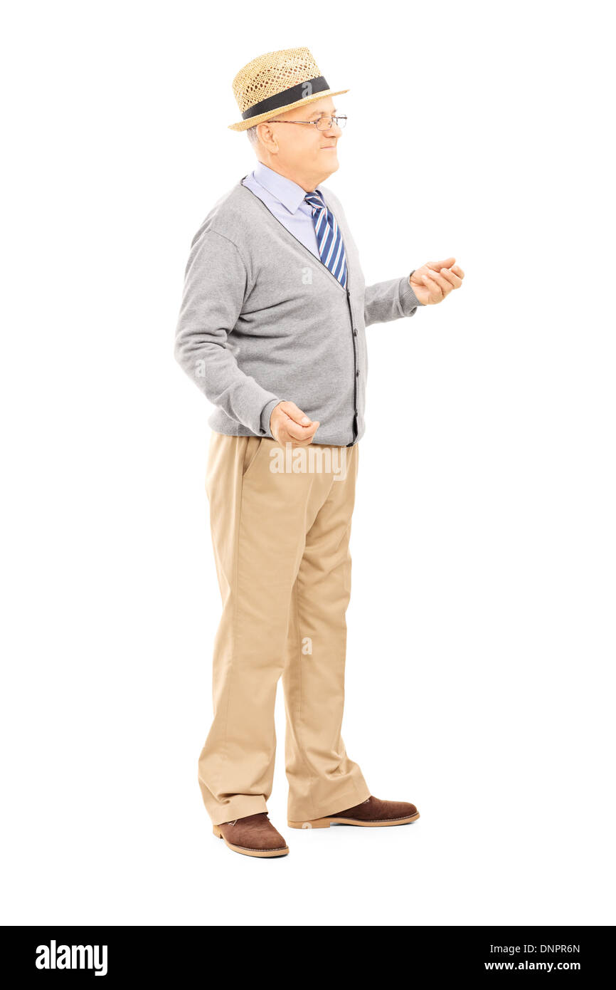 Full length portrait of senior man standing isolated on white ...