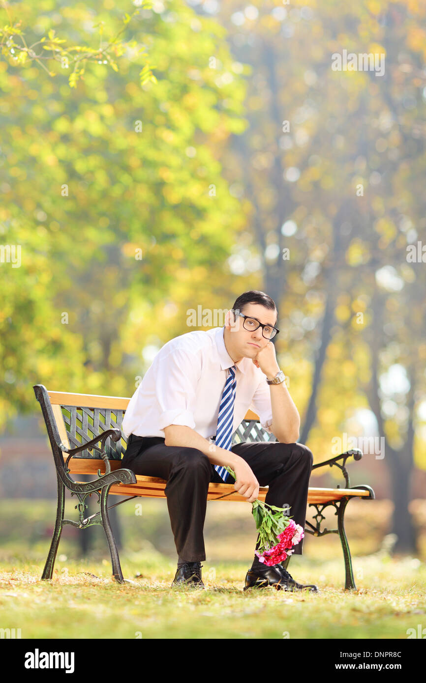 Person Waiting On A Bench