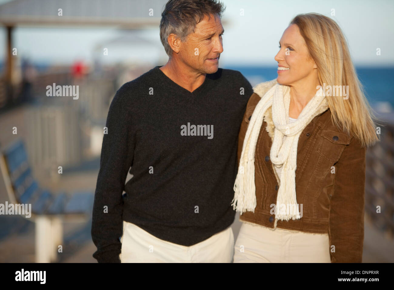 Cheerful couple strolling together hi-res stock photography and images ...
