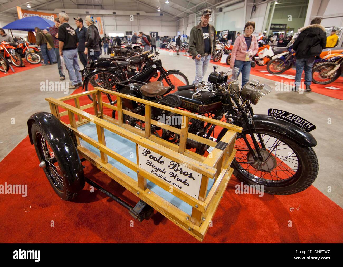 Toronto, Canada. 3rd Jan, 2014. Visitors look at a motorcycle made in ...