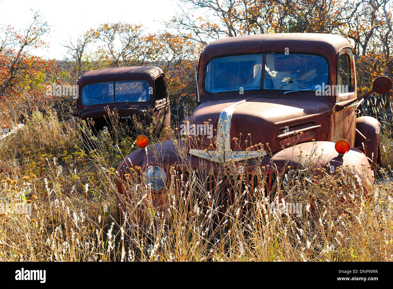 Old rusty cars parked and abandoned in a vacant lot near Lake Brownwood ...