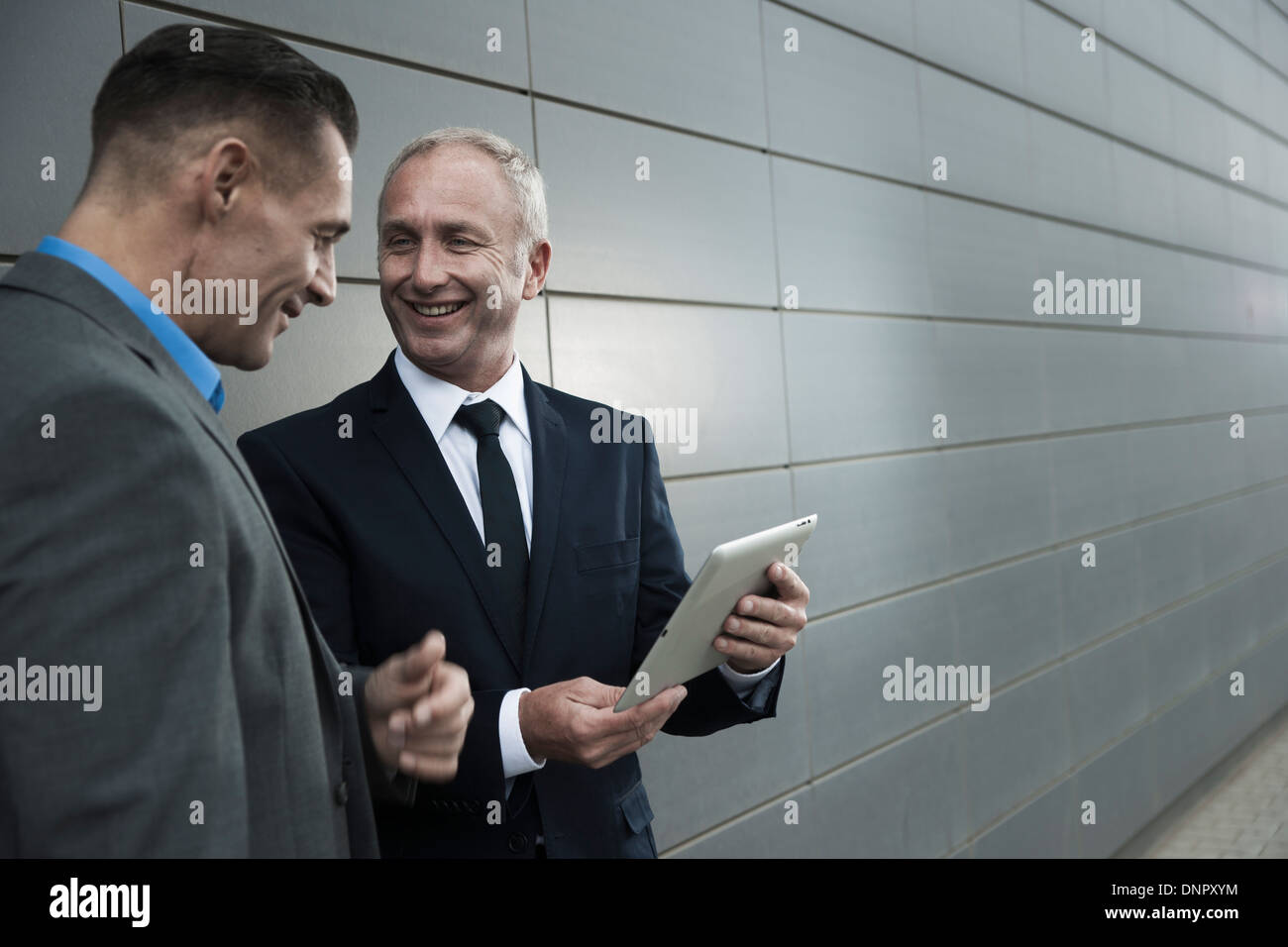 Black businessmen talking standing hi-res stock photography and images ...