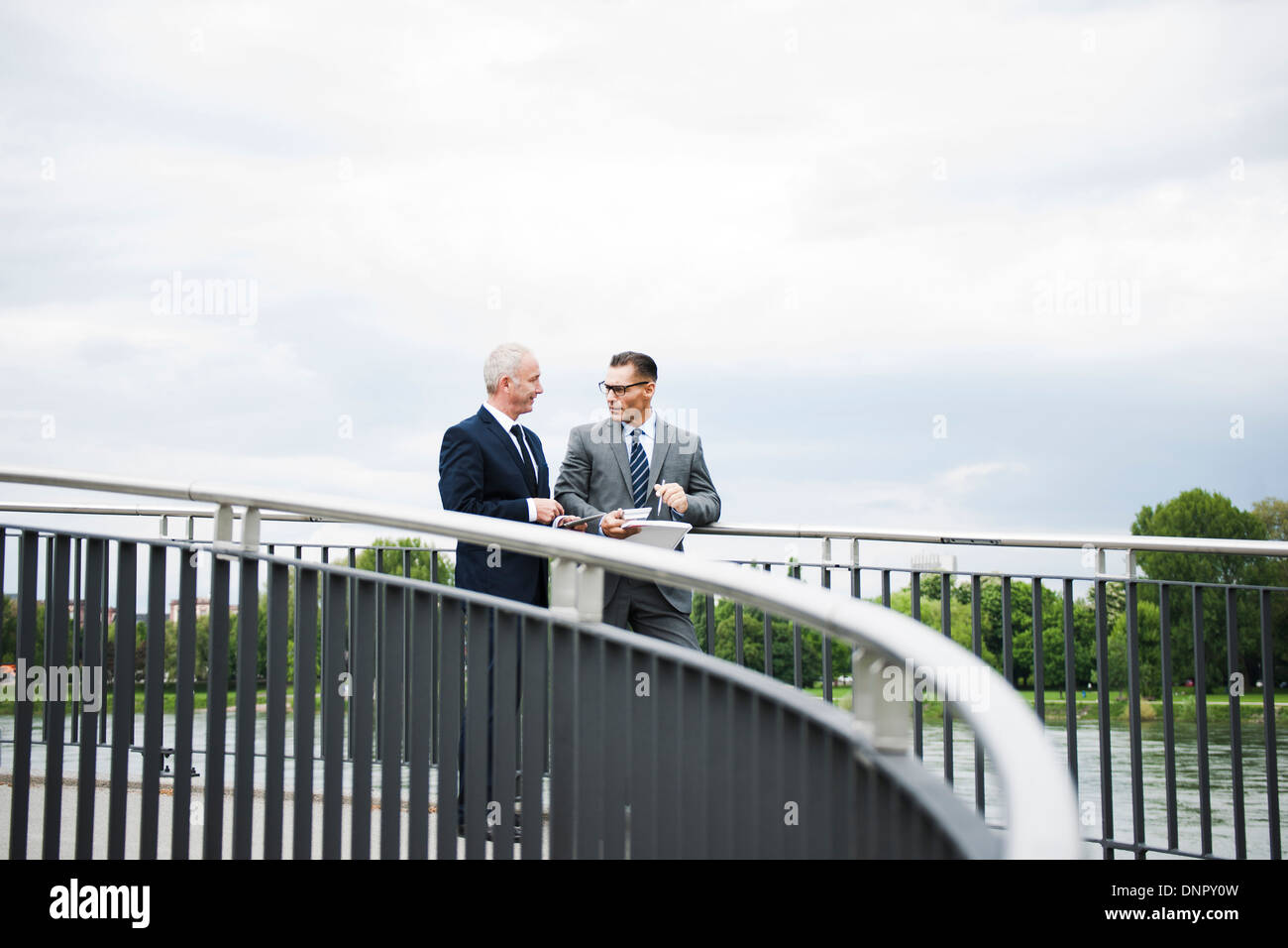 Two old people talking to each other hi-res stock photography and ...