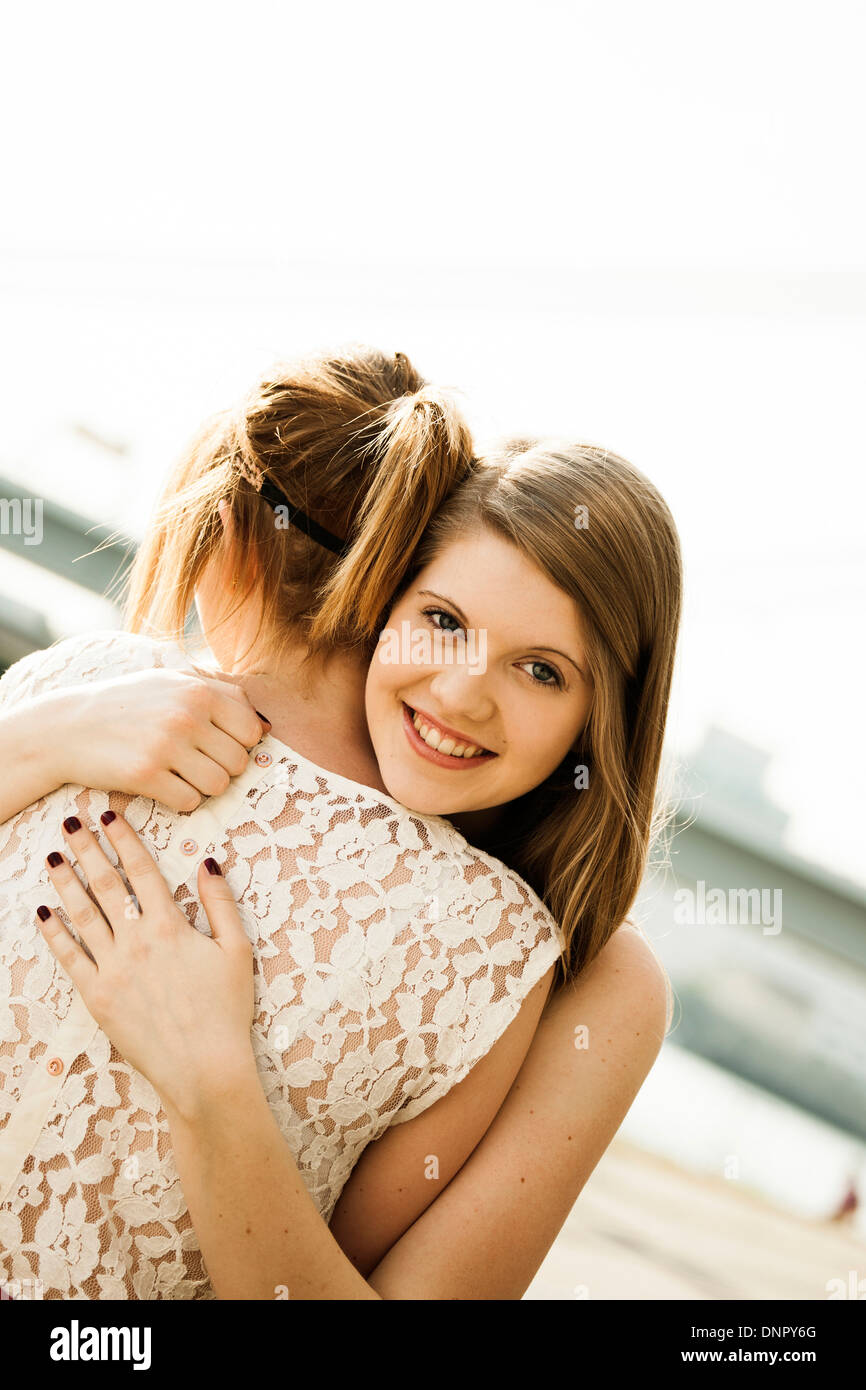 Women embracing hi-res stock photography and images - Alamy