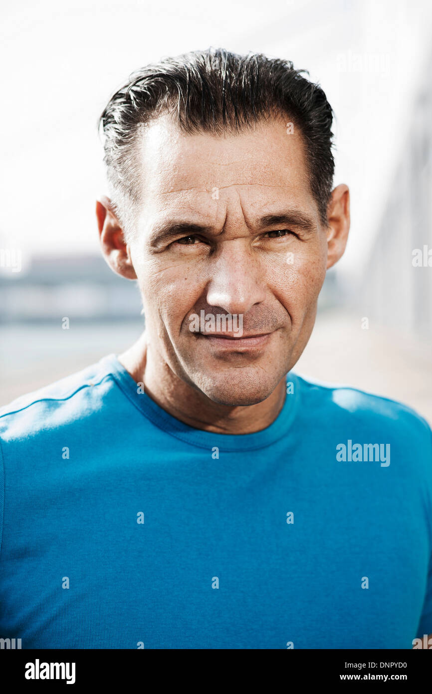 Male tshirt looking at camera hi-res stock photography and images - Alamy