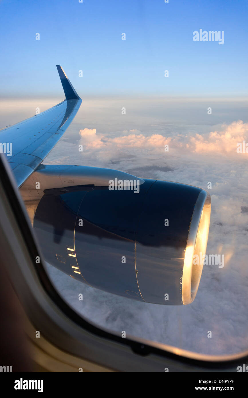 Airplane Wing and Engine from Cabin Window Stock Photo - Alamy