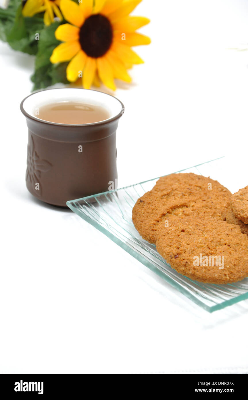 Chinese tea, cookies and sunflower Stock Photo - Alamy