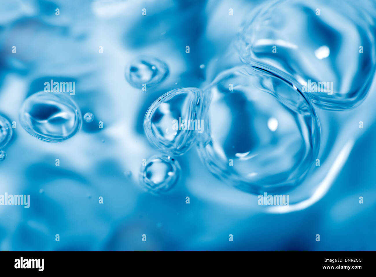 Water and bubbles. Moving surface of the water Stock Photo - Alamy
