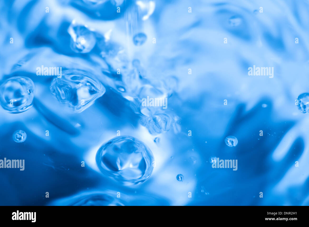Water and bubbles. Moving surface of the water Stock Photo - Alamy