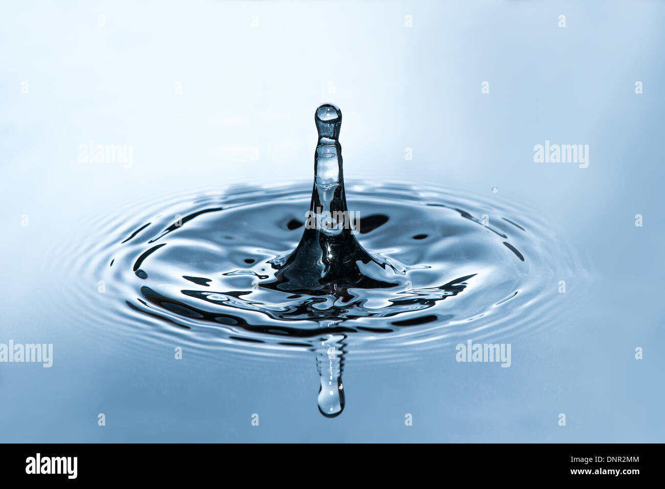 Blue water drop falling hi-res stock photography and images - Alamy