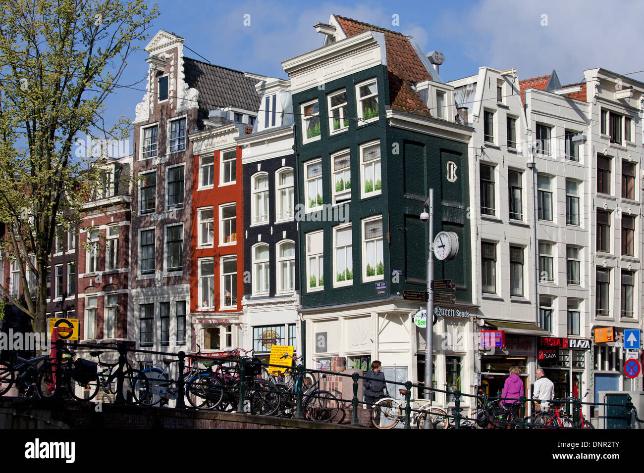 Corner of Oudezijds Voorburgwal and Damstraat street in the city center ...