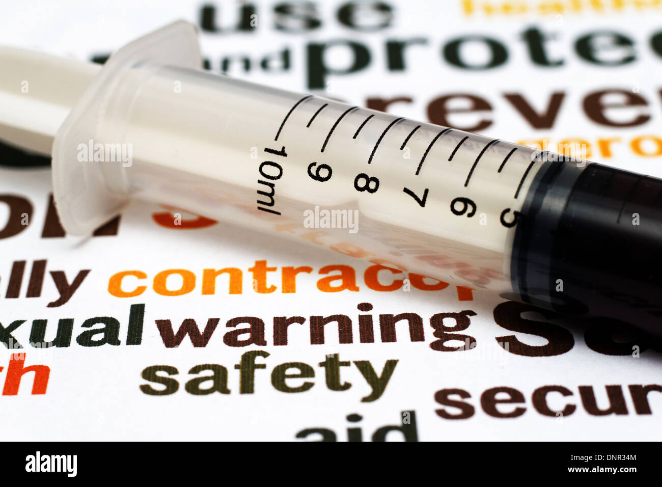 Syringe and safety concept Stock Photo - Alamy