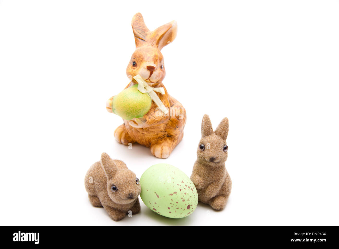 Easter bunnies with egg Stock Photo - Alamy