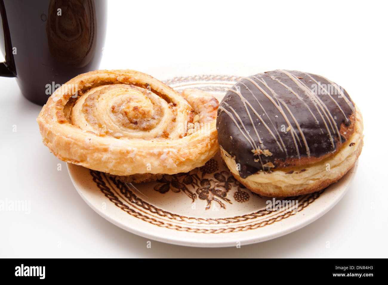 Chocolate doughnuts with nut snail Stock Photo - Alamy