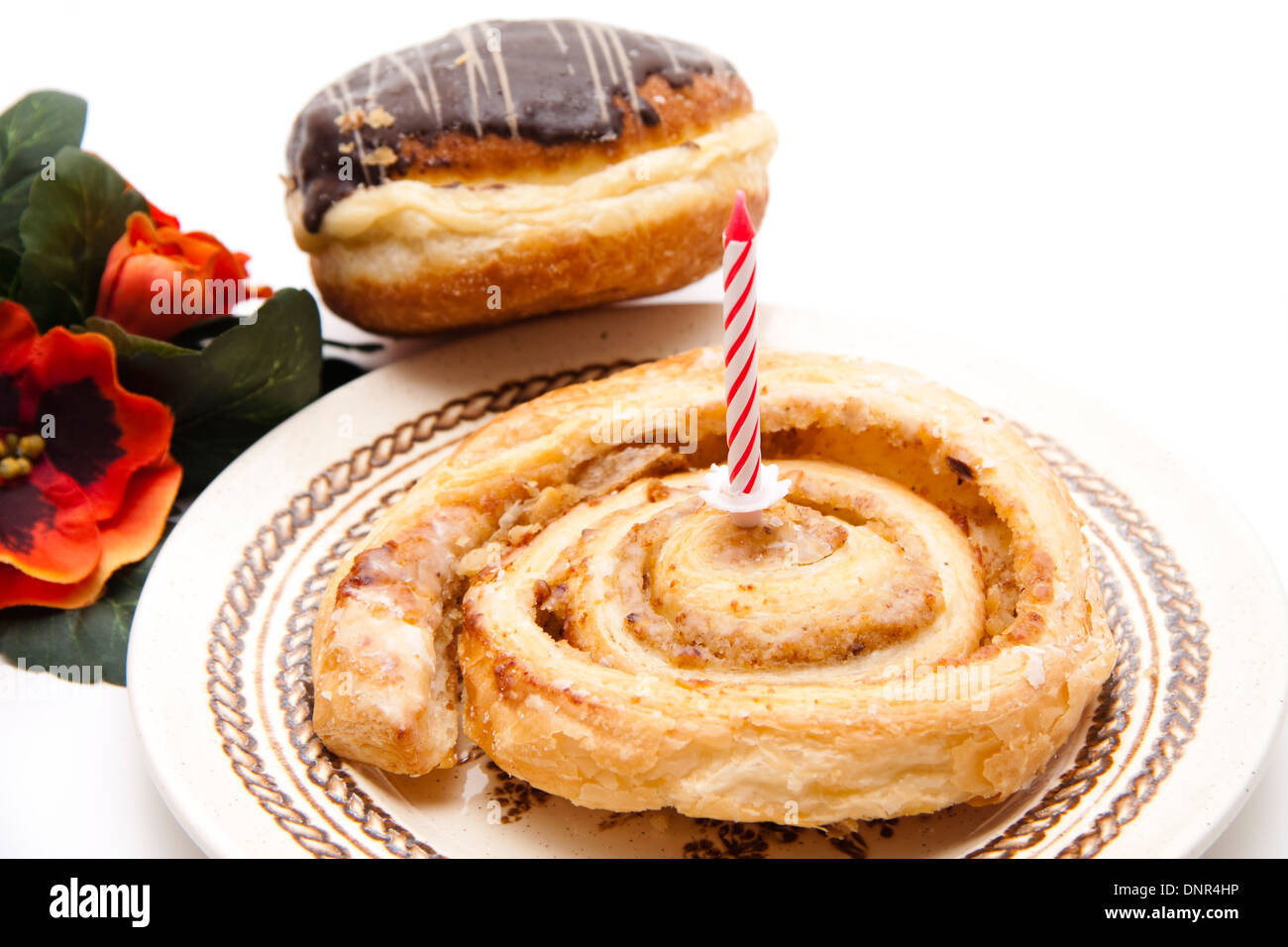 Nut snail with candle Stock Photo - Alamy