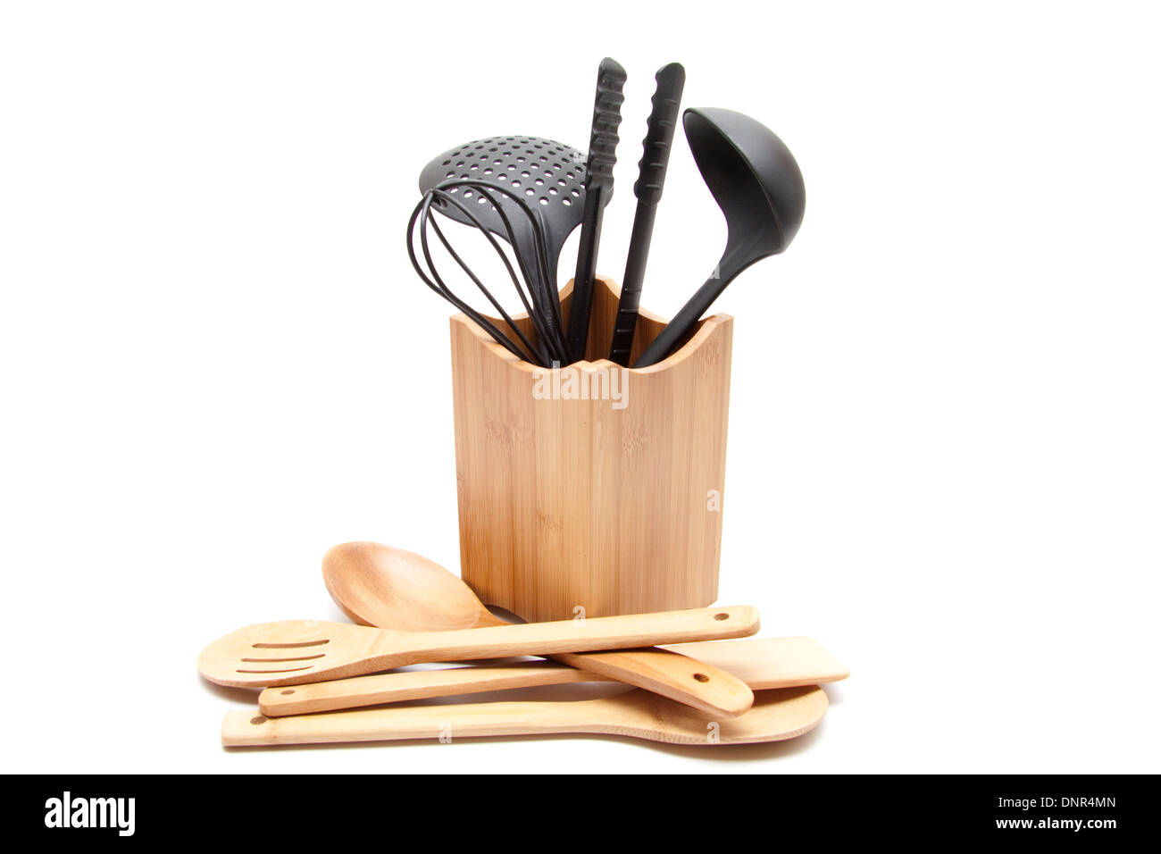 Grill tongs with soup trowel and cooking spoon Stock Photo - Alamy
