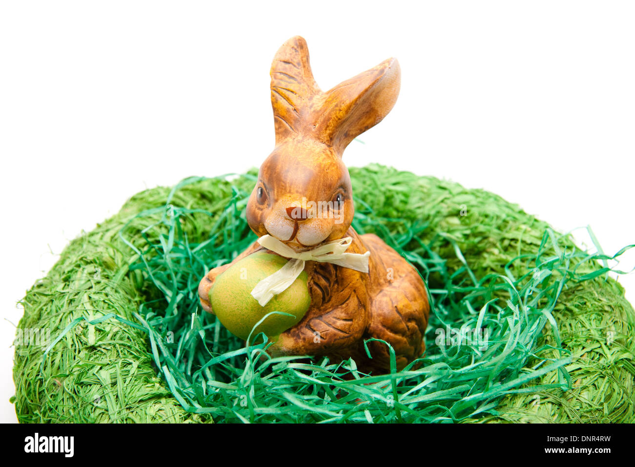 Easter bunny with Easter grass Stock Photo - Alamy