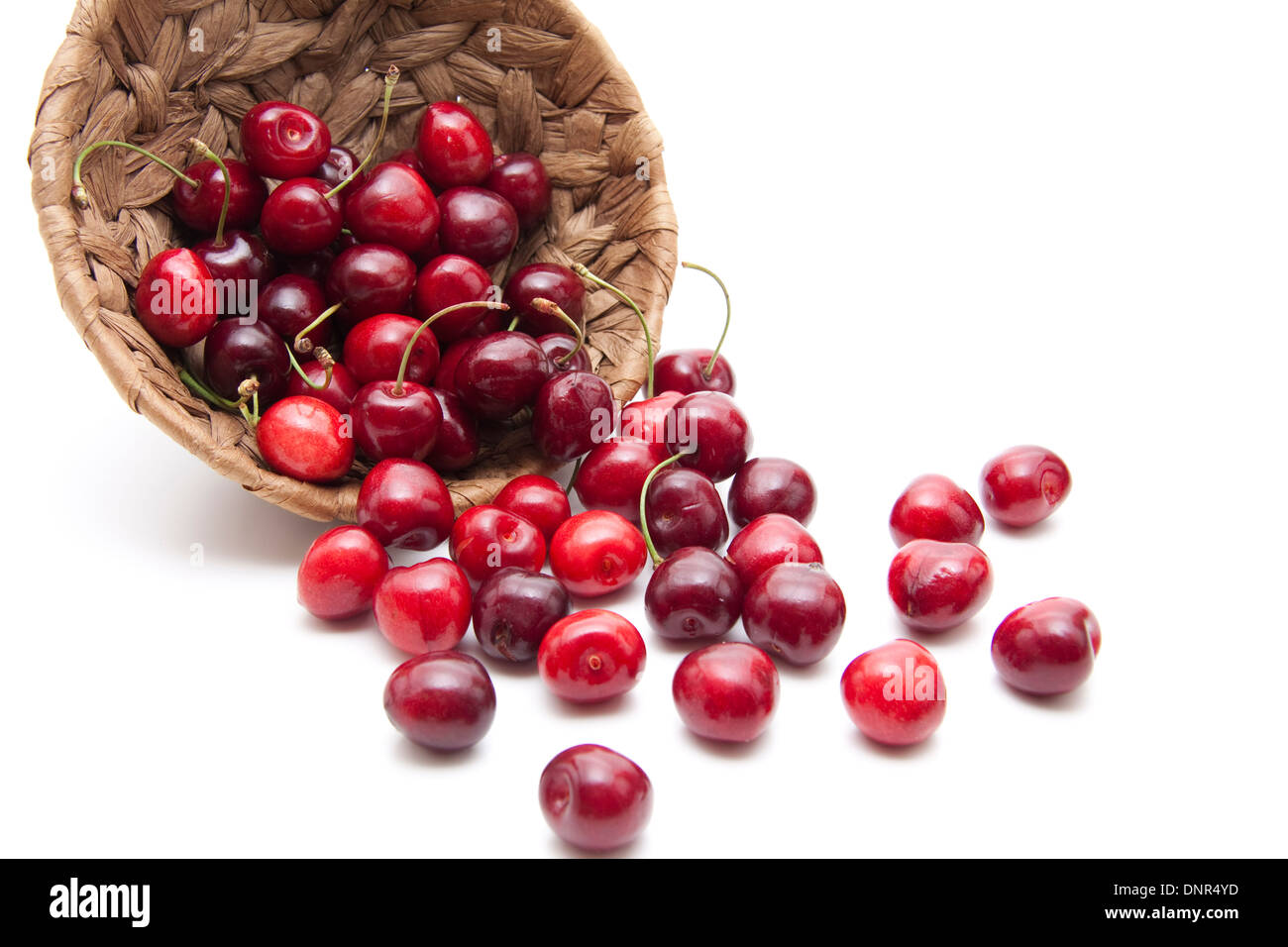 Fresh cherries with basket Stock Photo - Alamy