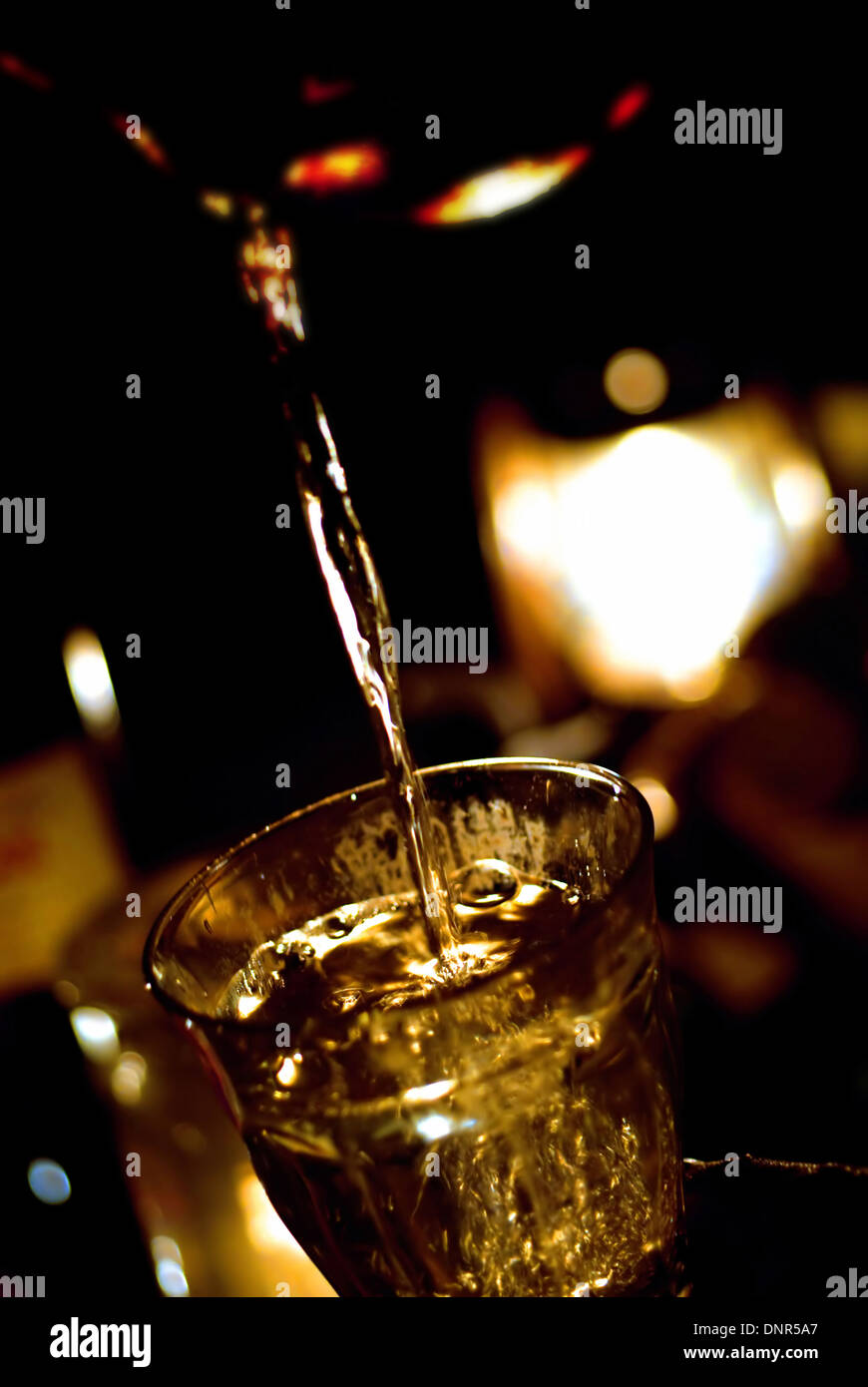 Pouring a refreshing glass of water Stock Photo - Alamy