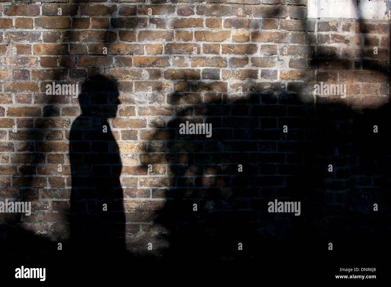 Mysterious man shadow hi-res stock photography and images - Alamy