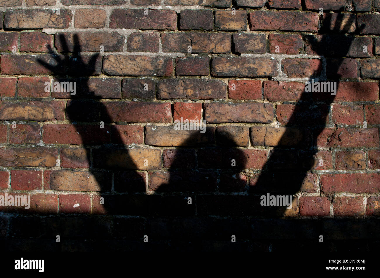 Male figure in shadow hi-res stock photography and images - Alamy