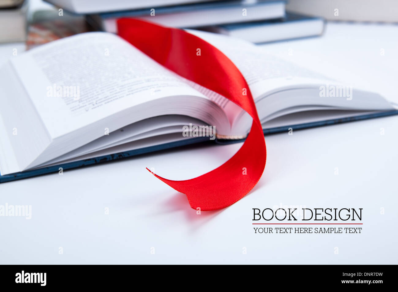 Open book with red ribbon hi-res stock photography and images - Alamy