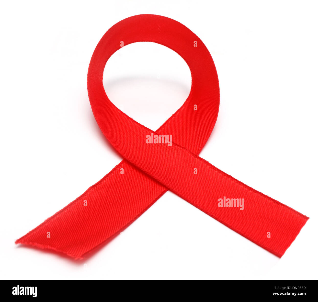Closeup of red ribbon over white background Stock Photo - Alamy