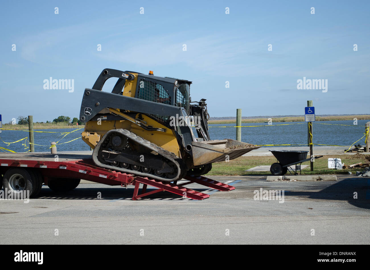 Compact track loader machine ready for roadside construction work being ...