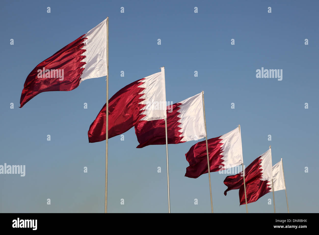 Qatar national flag hi-res stock photography and images - Alamy