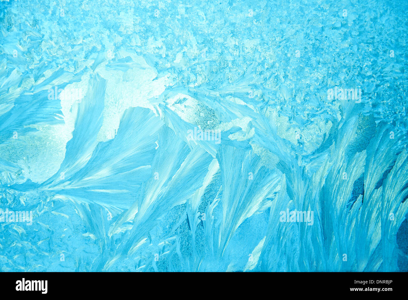Beautiful texture of frozen glass, blue color Stock Photo - Alamy