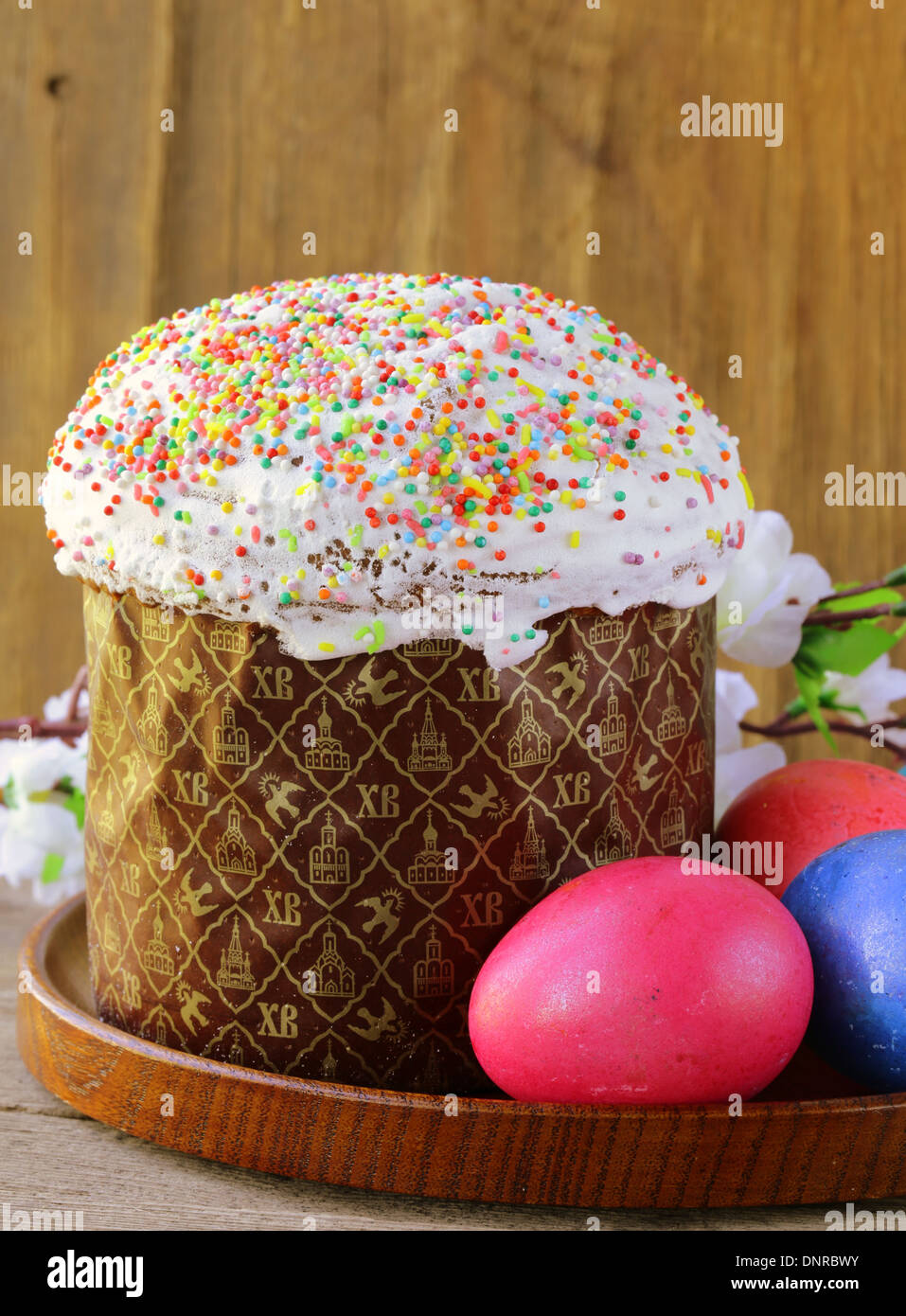 traditional Easter cake with glace icing and colorful eggs Stock Photo ...