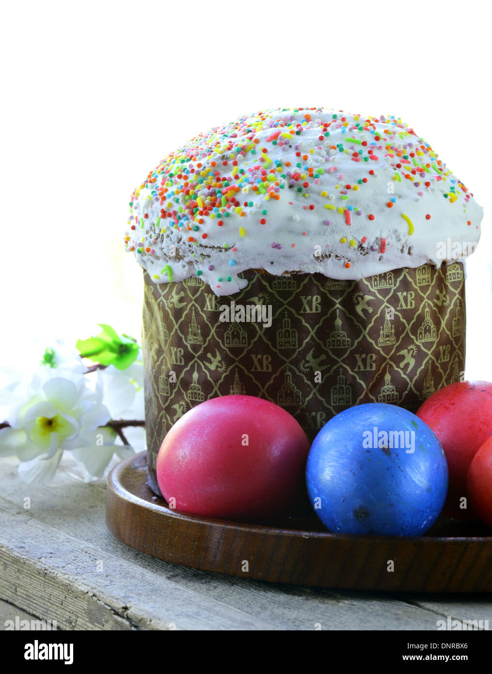 traditional Easter cake with glace icing and colorful eggs Stock Photo ...