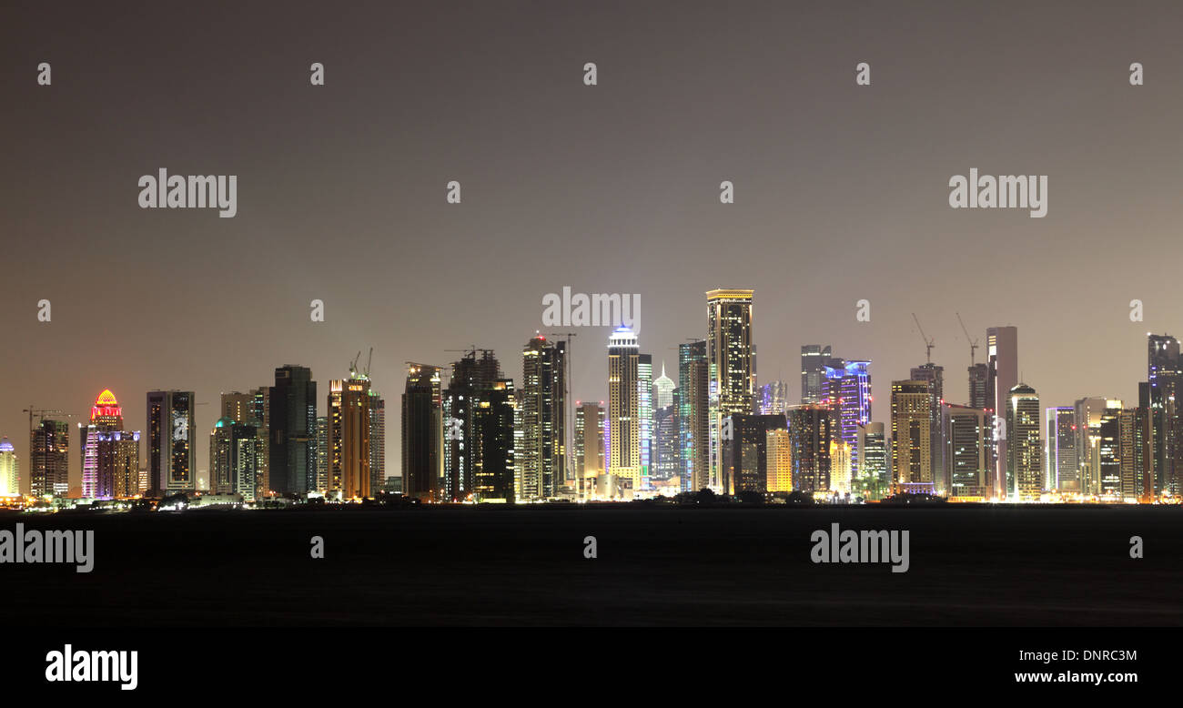 Doha downtown skyline at night, Qatar, Middle East Stock Photo - Alamy
