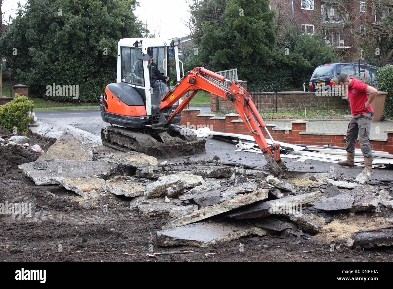 Man in mini digger hi-res stock photography and images - Alamy