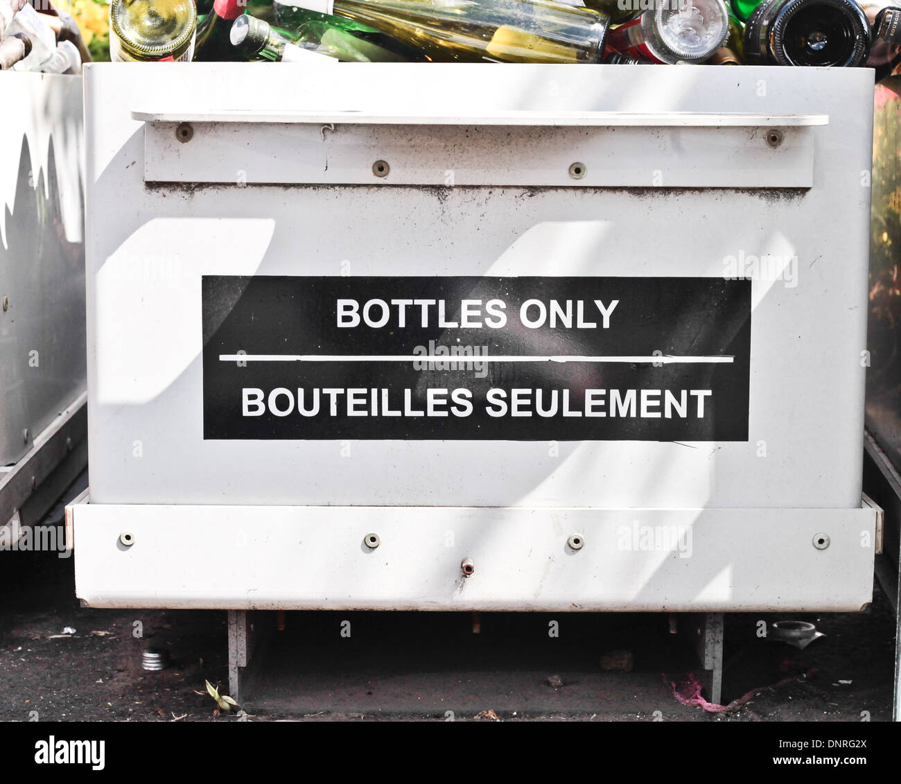 A bottle recycling bin at a waste site Stock Photo - Alamy