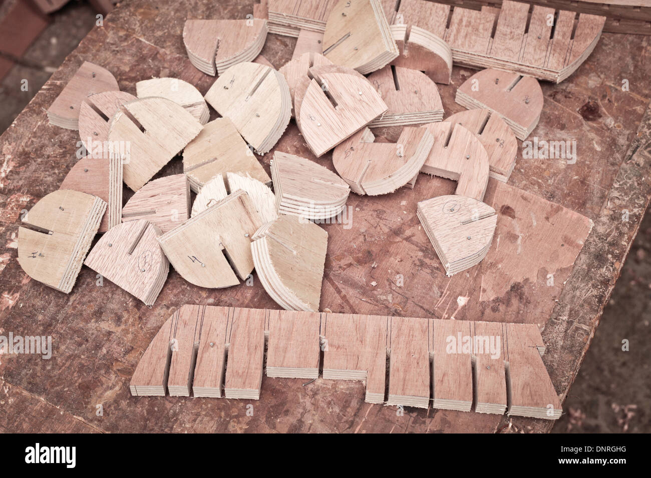 Parts for building models ships on a table Stock Photo - Alamy