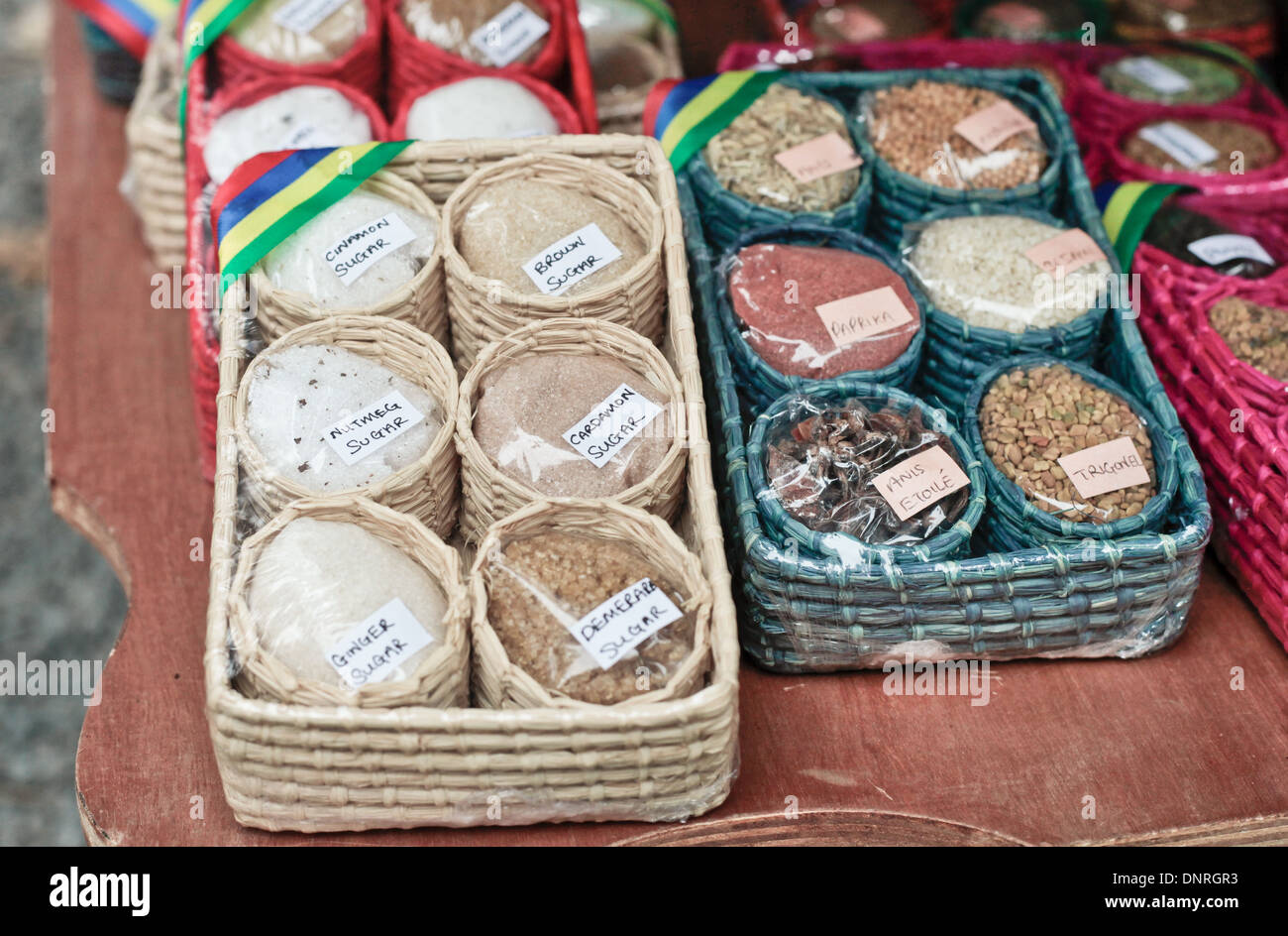 Bakets of sugar and spices for sale at a market stall in Mauritius ...