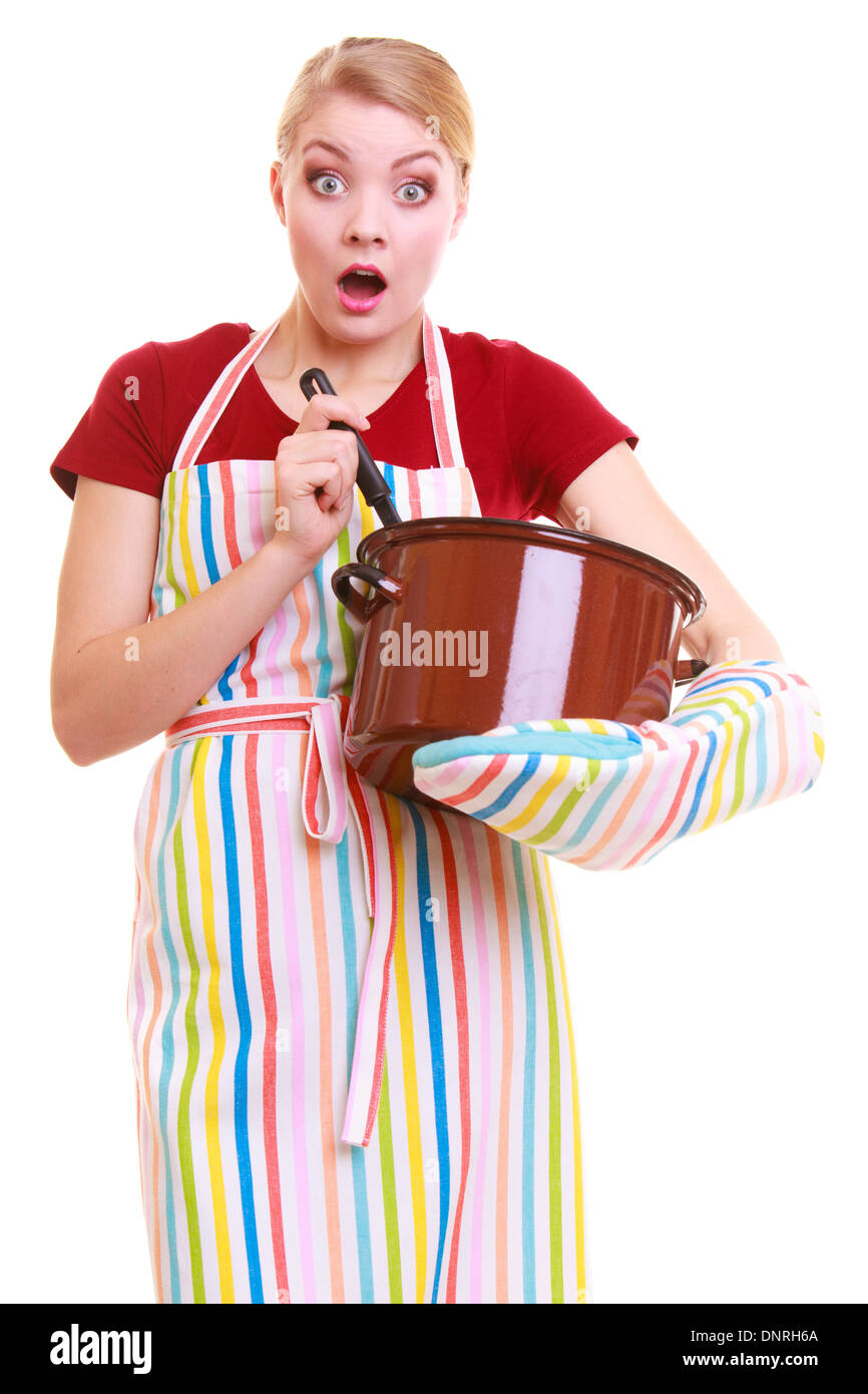 Surprised shocked emotional housewife or chef in colorful kitchen apron ...