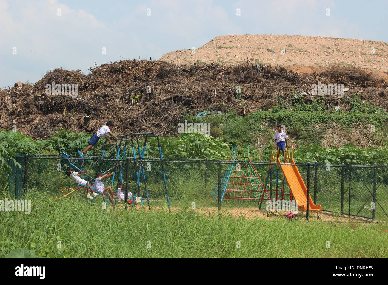 Colombo, Sri Lanka. 18th Nov, 2013. Children play on the playground of ...