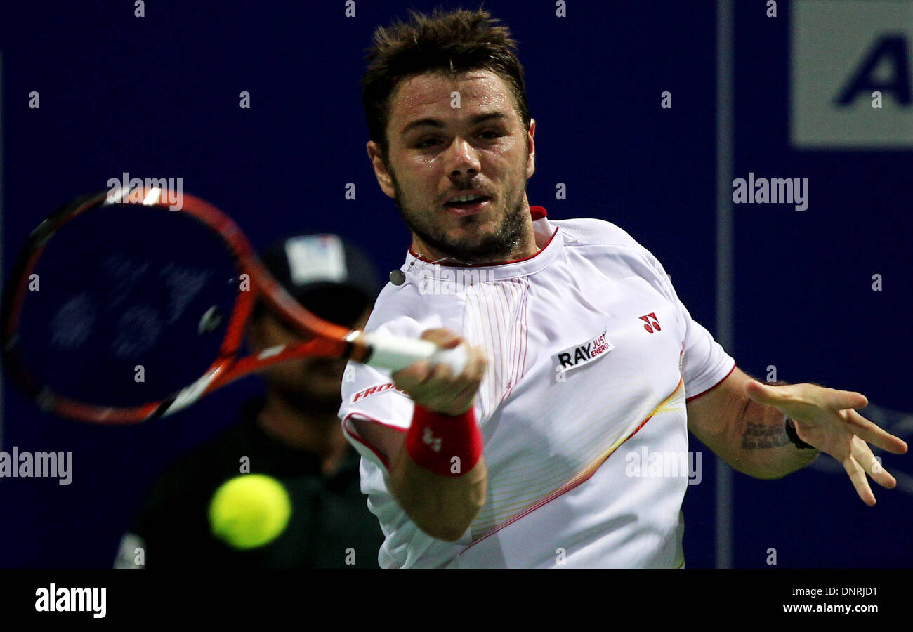 Chennai, India. 4th Jan, 2013. Stanislas Wawrinka of Switzerland hits a ...