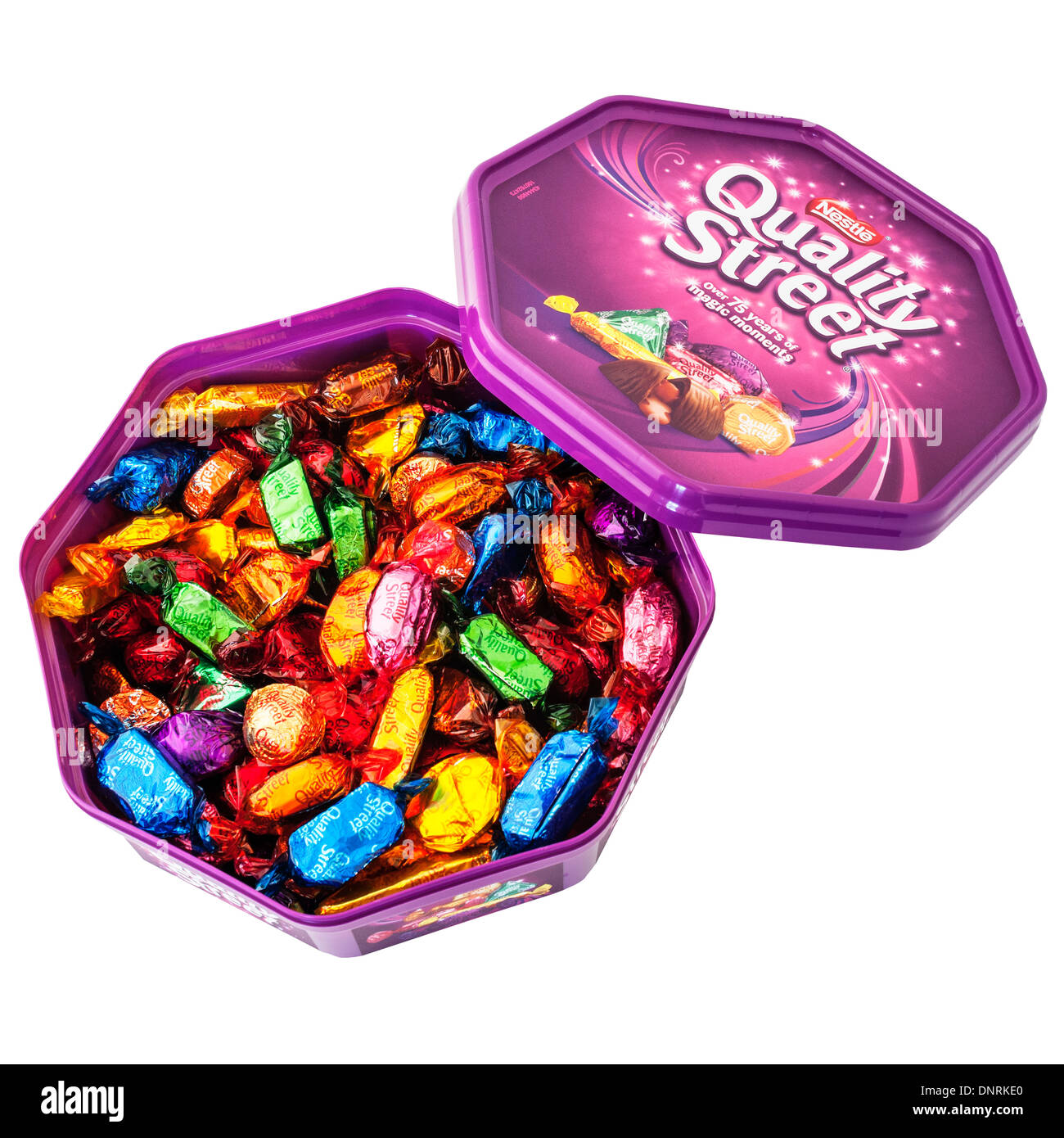 A tub of Nestle Quality Street chocolates sweets on a white background ...