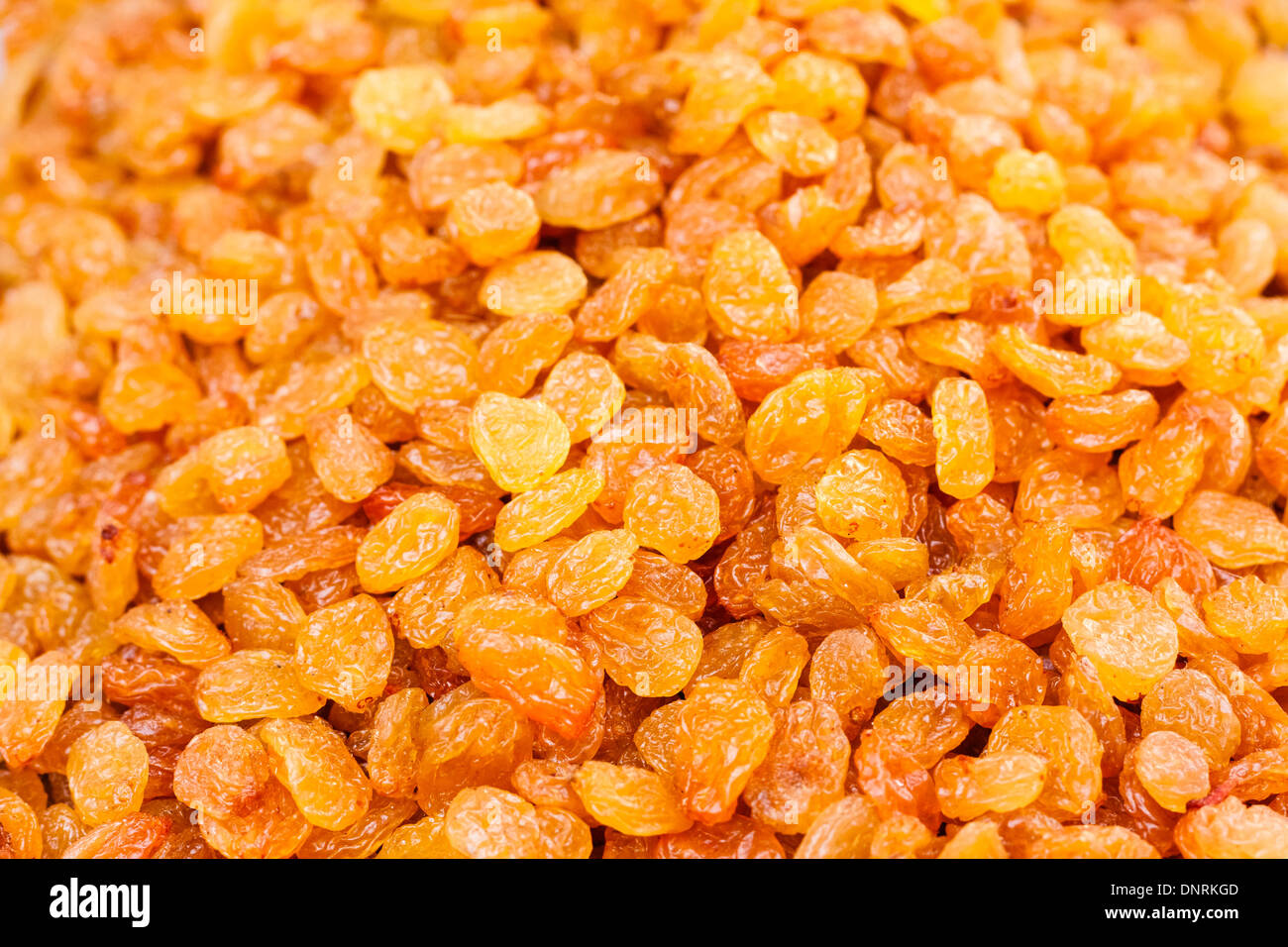 Golden Dried Raisins Background Stock Photo - Alamy