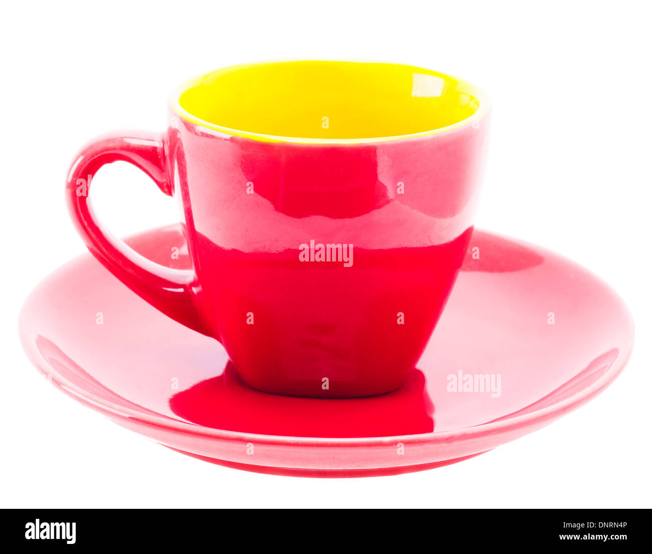 Red Color Cup On Plate Isolated On White Background Stock Photo - Alamy
