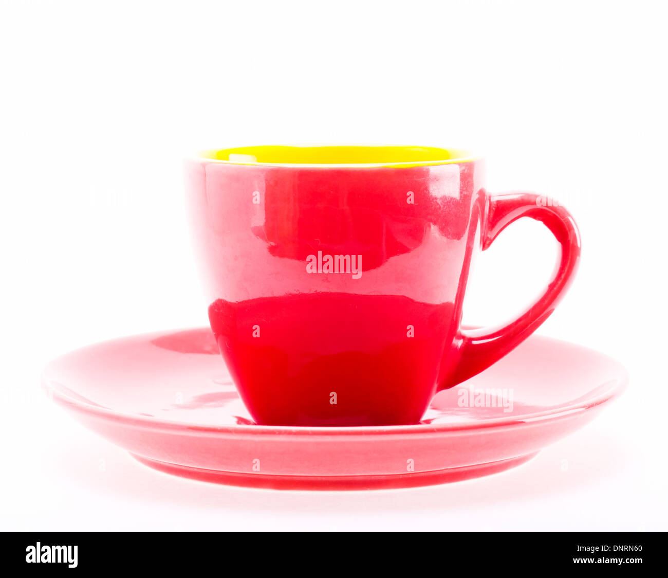 Red Color Cup On Plate Isolated On White Background Stock Photo - Alamy