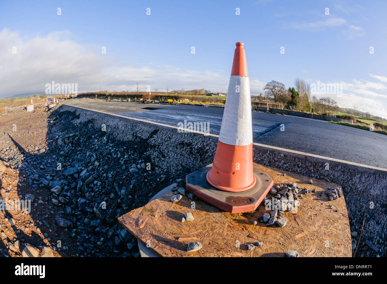 Traffic cone at the side of a newly constructed road Stock Photo - Alamy