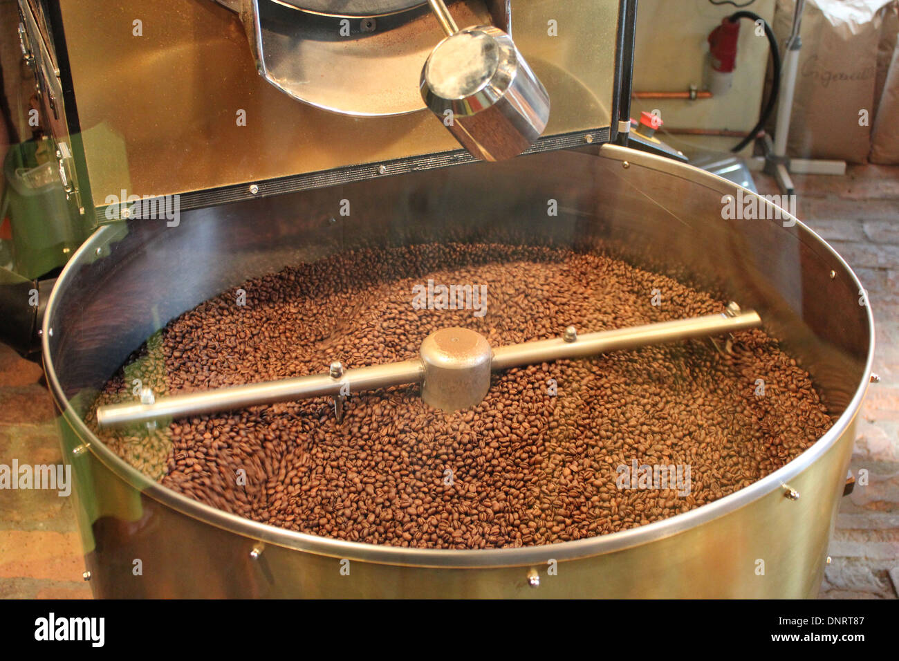 apparatus shuffling the drains of real Brazilian coffee Stock Photo - Alamy