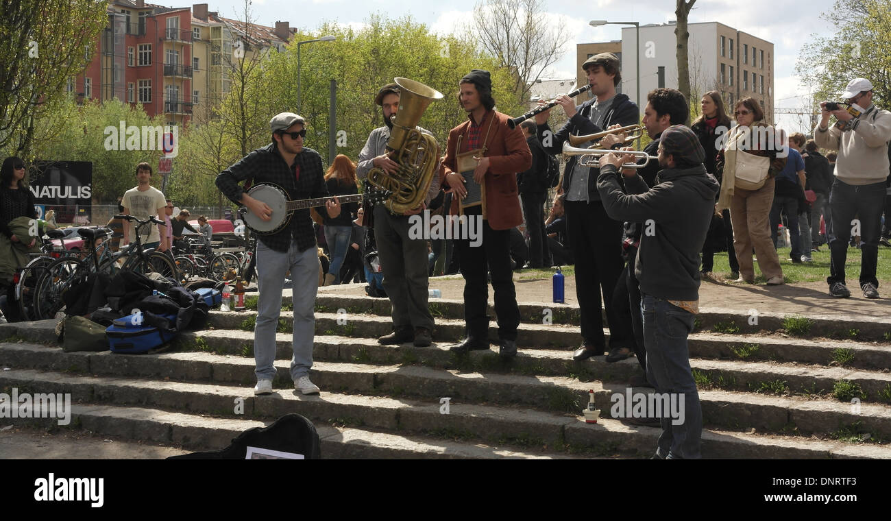 Sunny Sunday view group of six musicians playing musical instruments ...