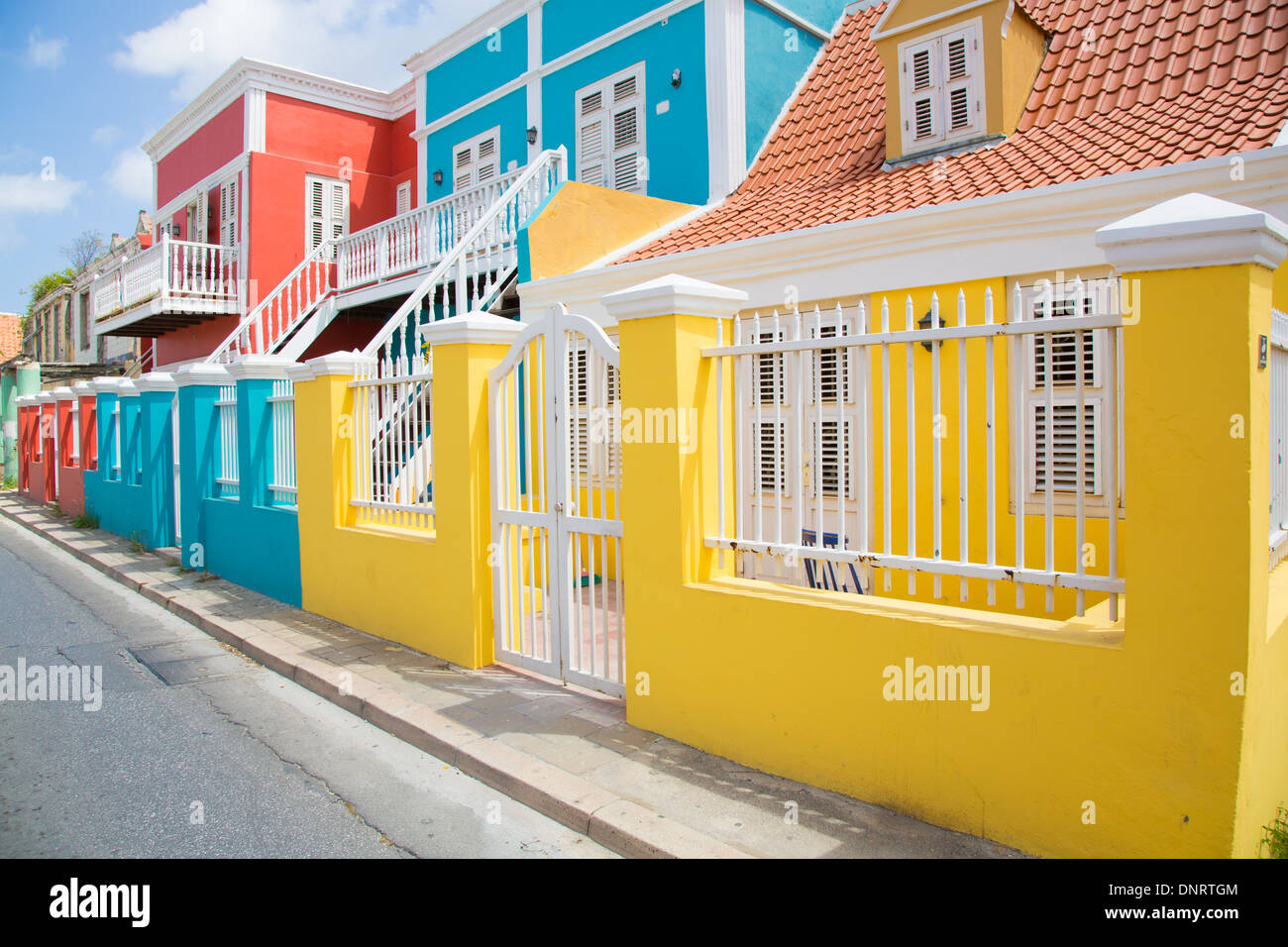 The bright colors of the dutch architecture in the city of Willemstad ...